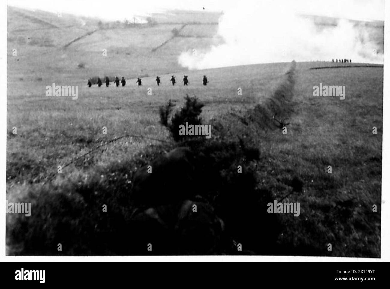 SMOKE SCREEN DEMONSTRATION - Troops advancing under the cover of a ...