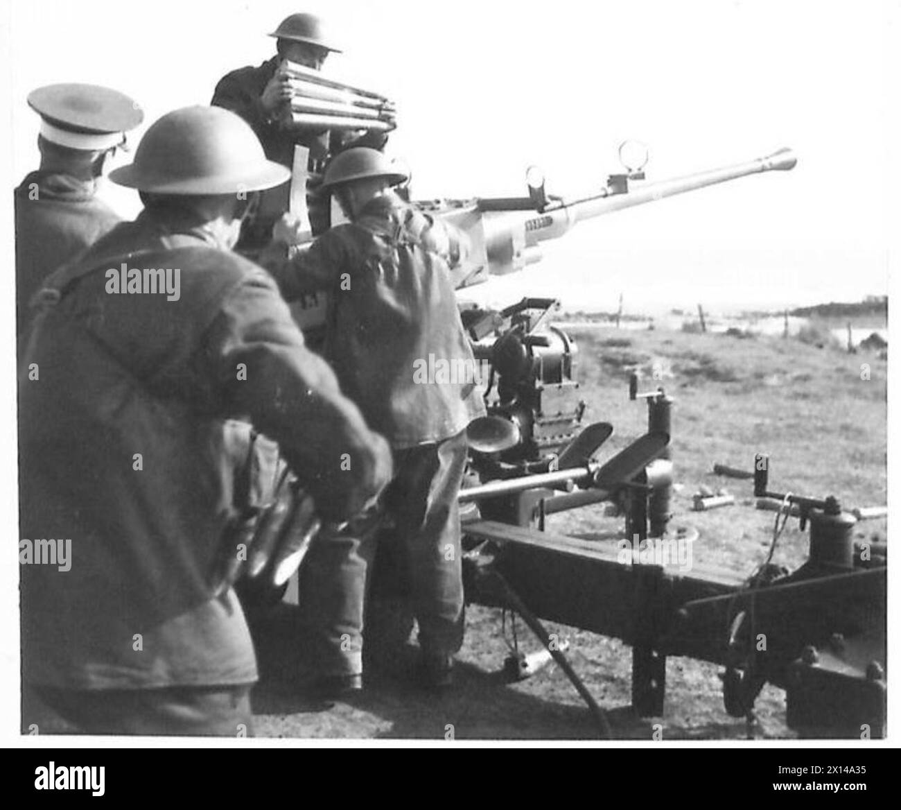 The gun crew operates the Bofors anti-aircraft gun during training ...