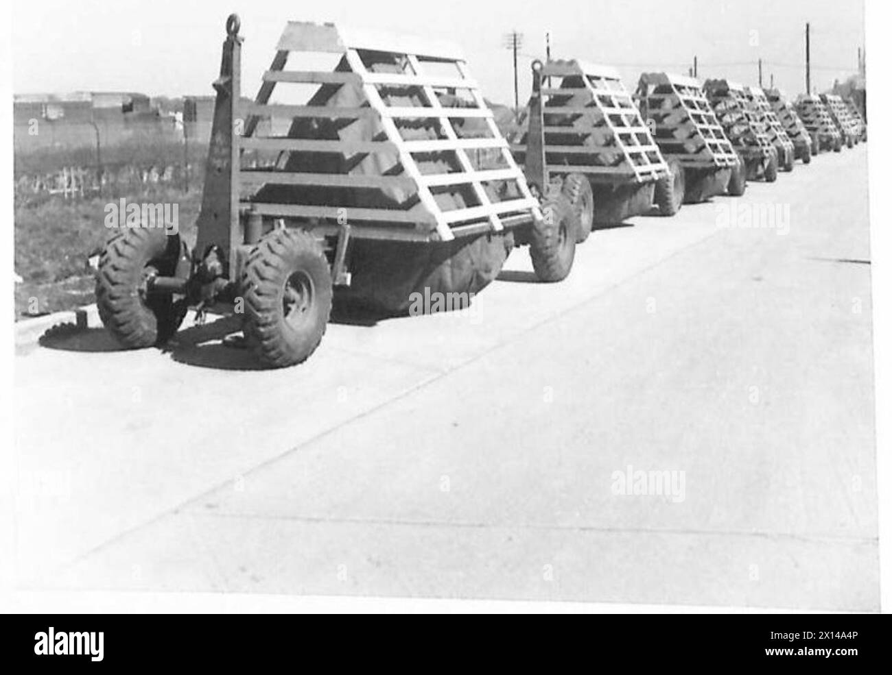 IN AN ORDNANCE DEPOT - 50 mm Bofors Guns ready crated and packed ...