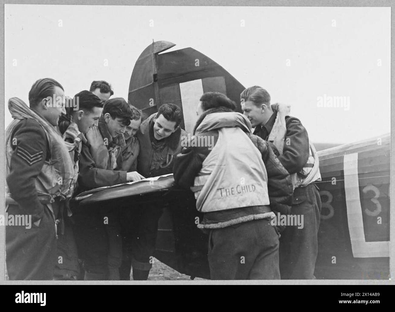 Pilots of No. 87 Fighter Squadron RAF plan a patrol at RAF Colerne on 4 ...