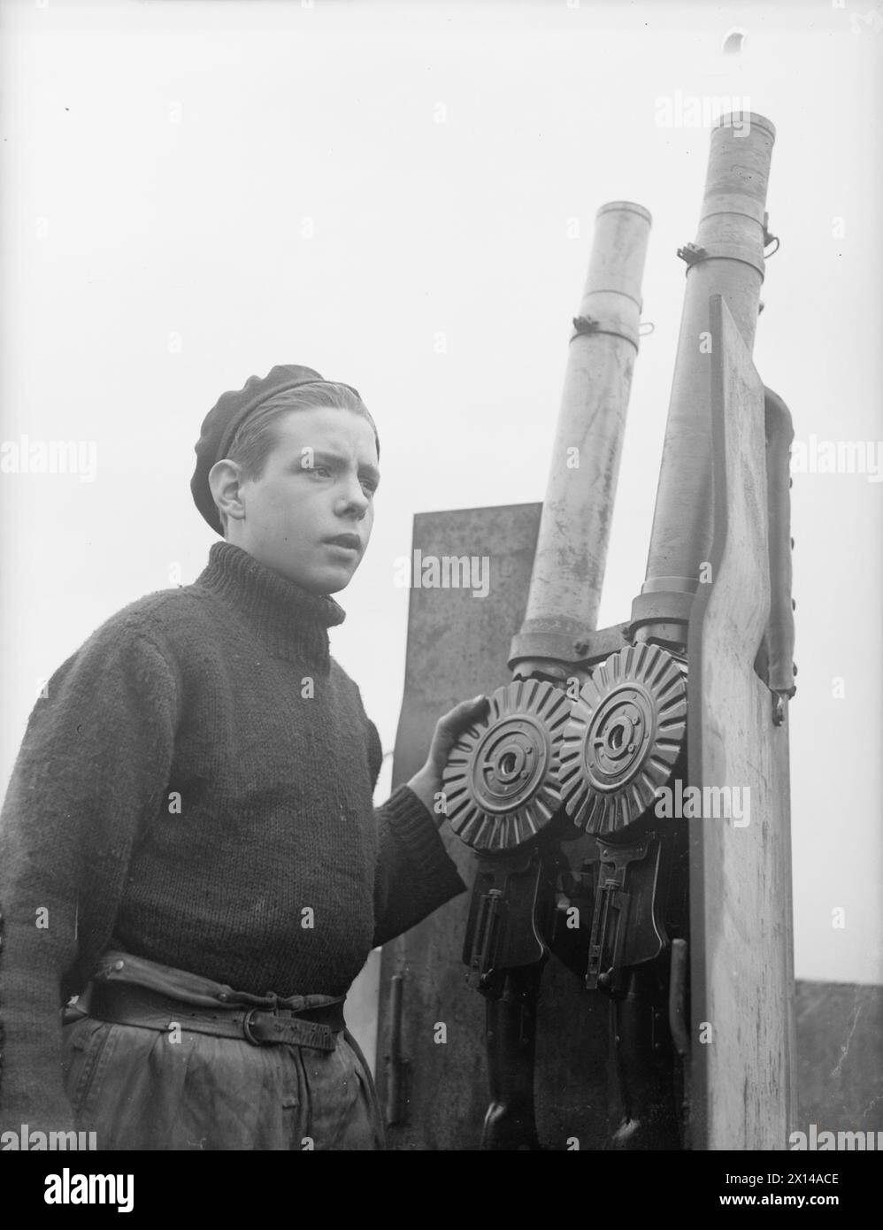 BRITAIN'S YOUNGEST MERCHANT SEAMAN GUNNER. 3 APRIL 1942, ON BOARD THE ...