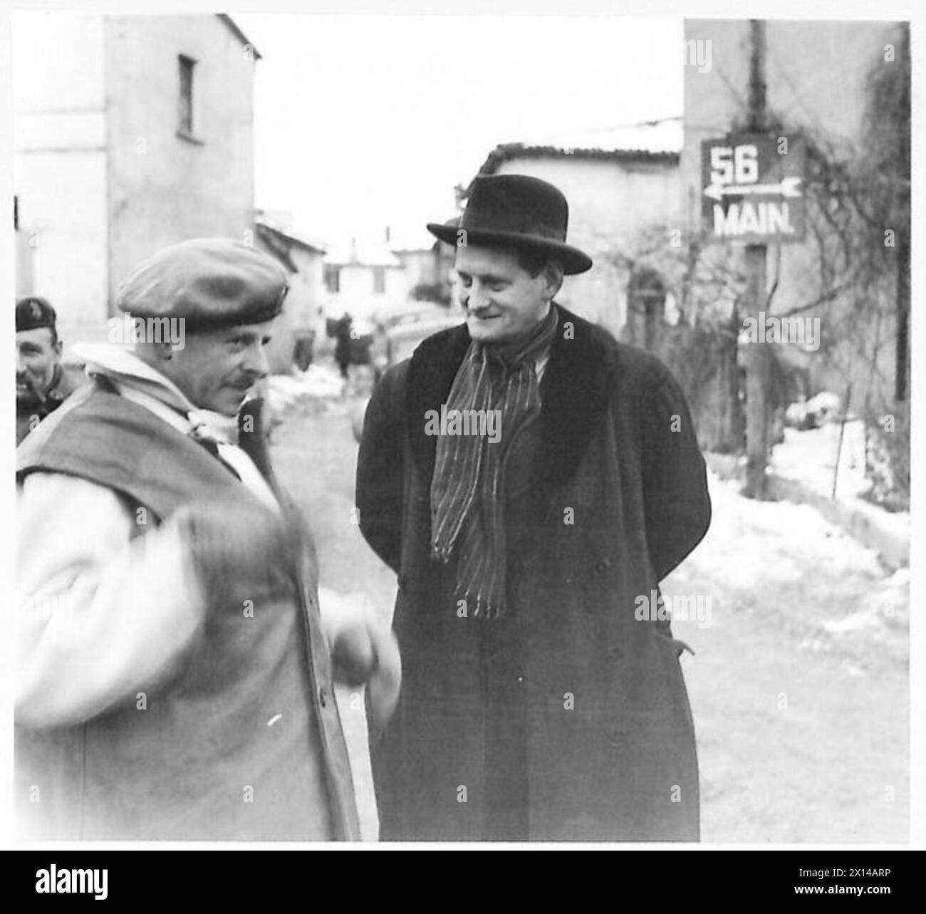 Major General J.W. Whitfield discusses front line operations with ...
