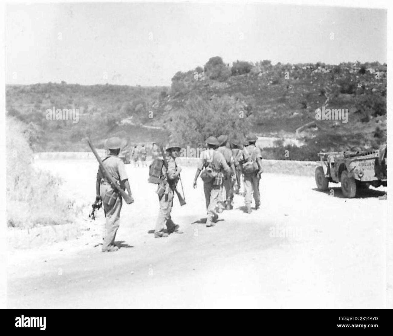 THE FALL OF AUGUSTA - Transport and men of the 1st K.O.Y.L.I. advancing ...