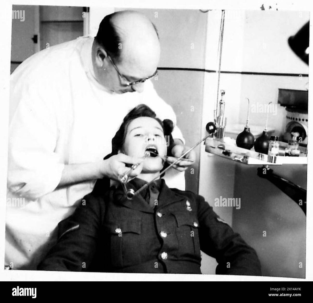 ARMY DENTAL CENTRE - Close up of ATS receiving routine treatment, such ...