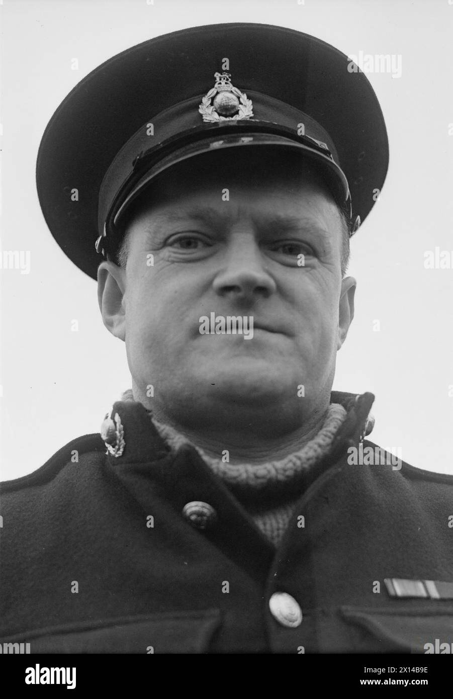 A Royal Marines corporal serves as gunlayer aboard the British merchant ...