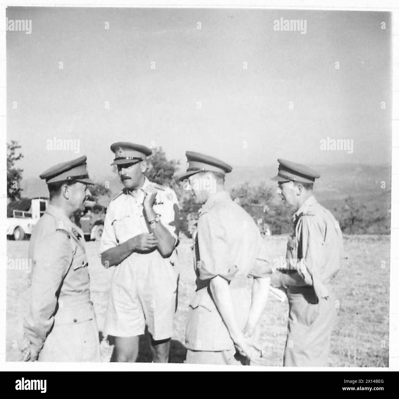 H.M. THE KING WITH THE EIGHTH ARMY - Left to right:- General Alexander ...