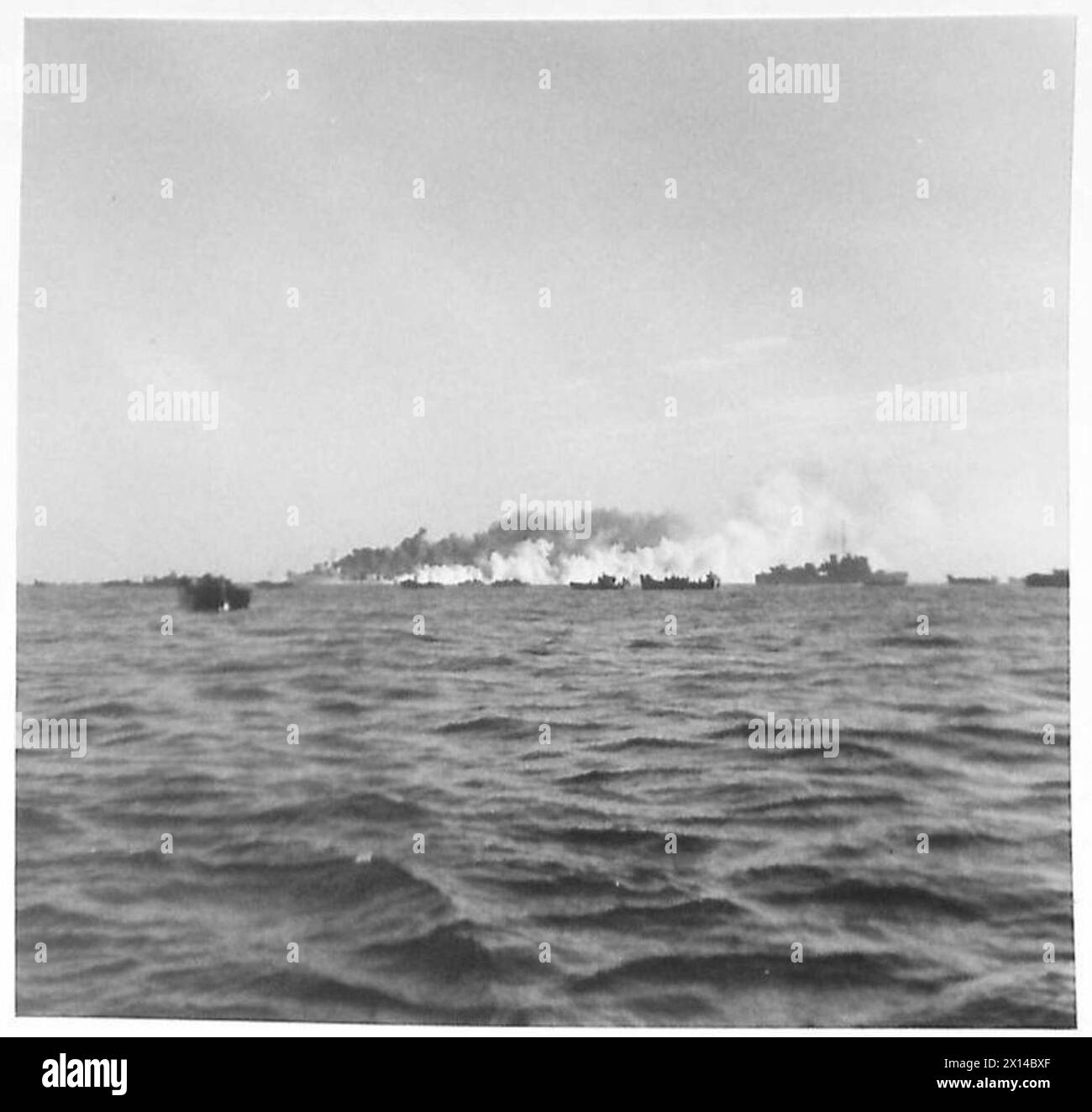 THE RAID ON DIEPPE - Naval vessel putting down a smoke screen for the ...
