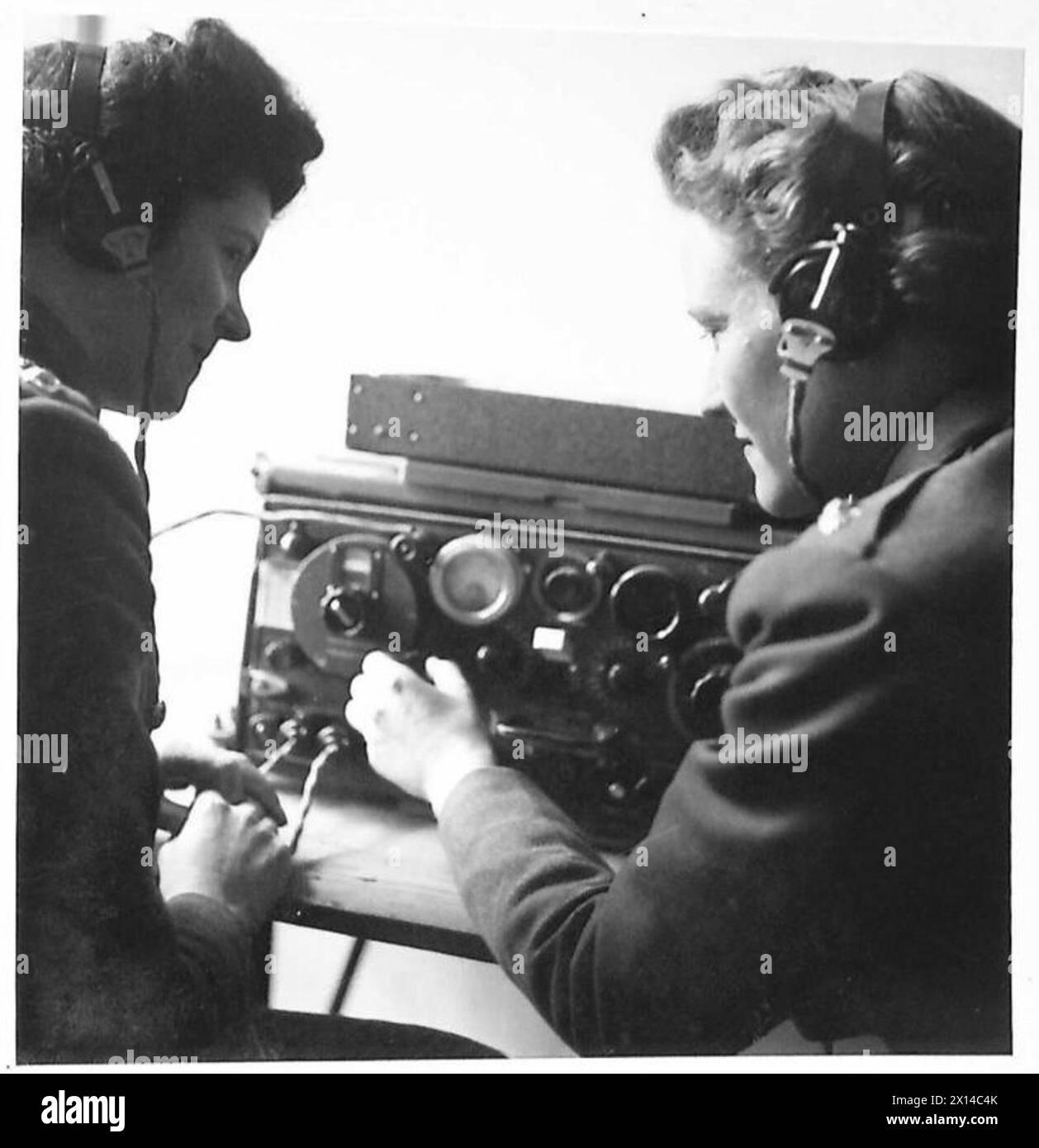 Two ATS officers at a signal school in Scotland receive wireless ...
