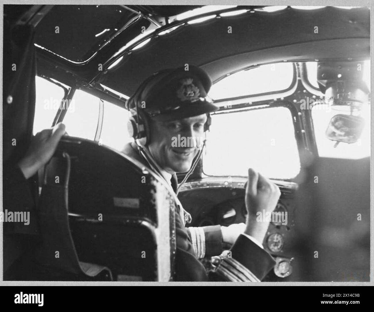 Captain K.E. Buxton of BOAC inspects a Liberator landplane before ...