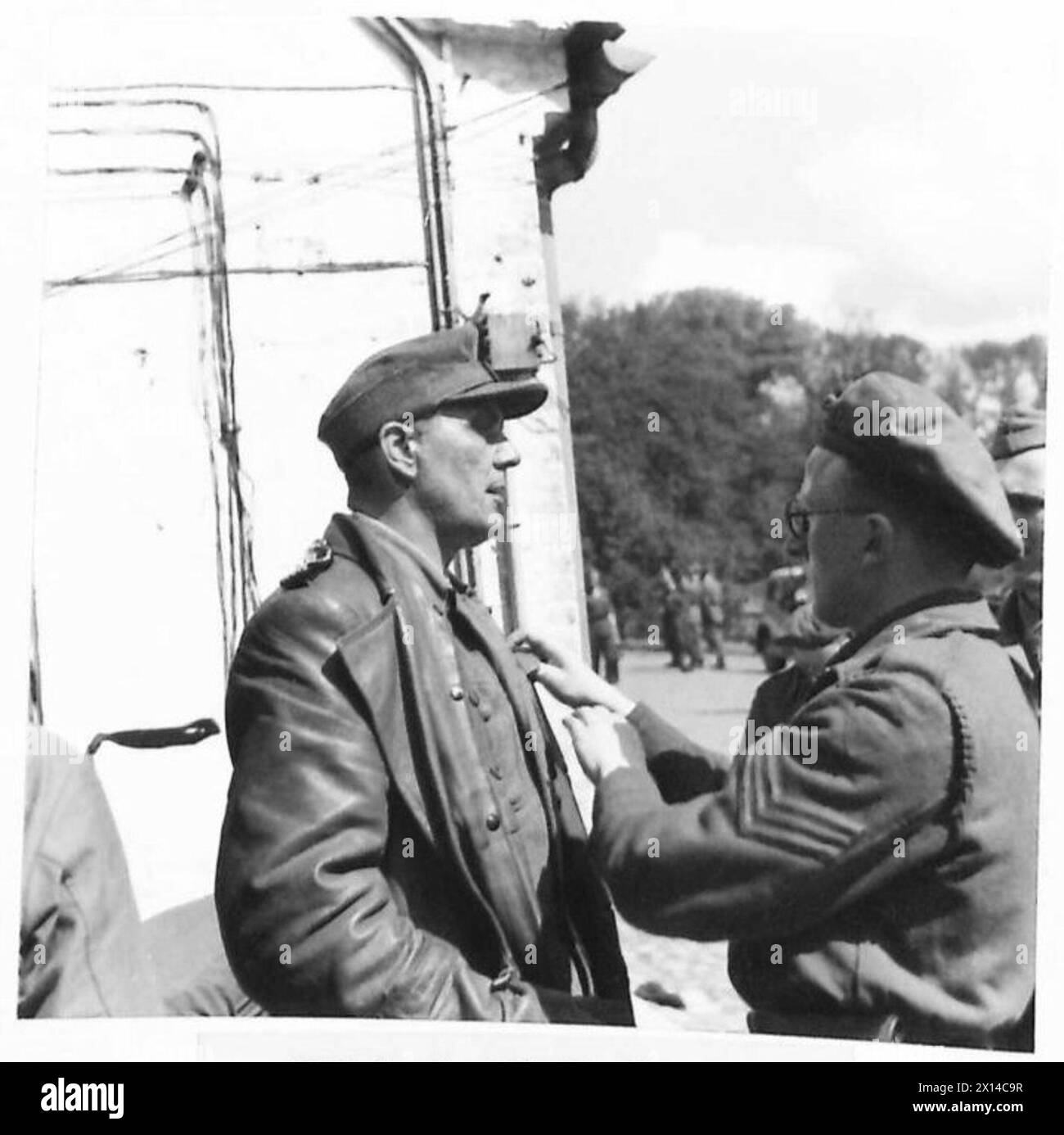 A German SS regiment arrives in Germany, with an SS officer being ...