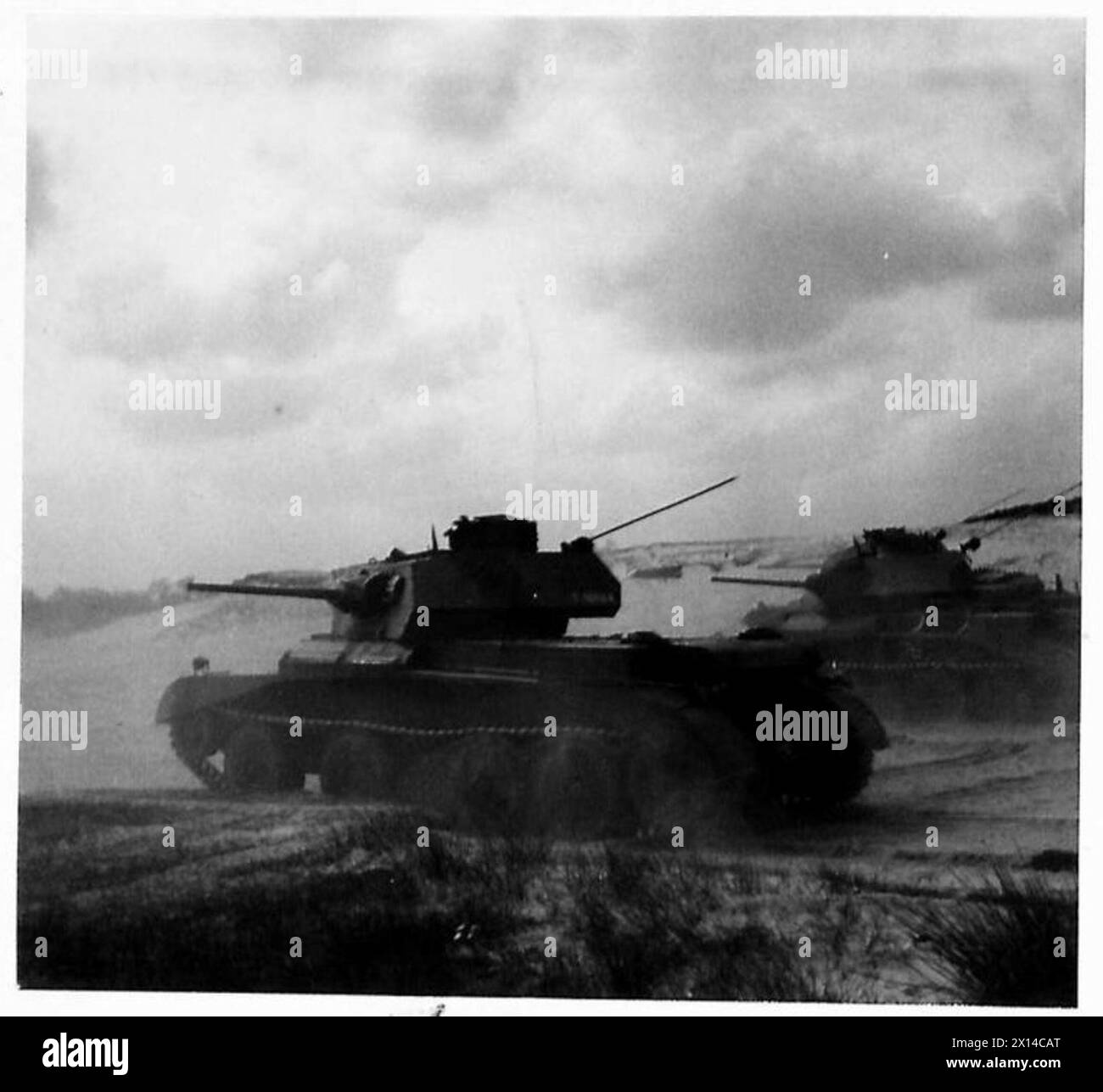 TANKS IN ACTION - Two of the latest cruiser tanks going into action ...