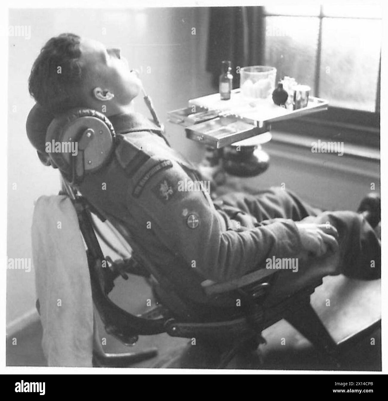 A corporal receives dental care using modern equipment from the Army ...