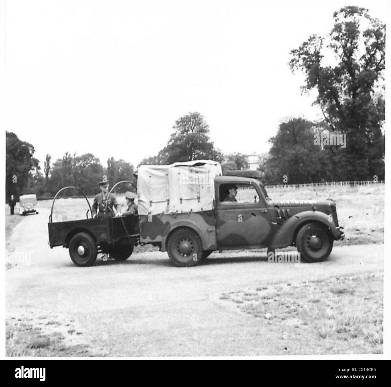 The Mathews trailer is shown attached to a light lorry, demonstrating ...