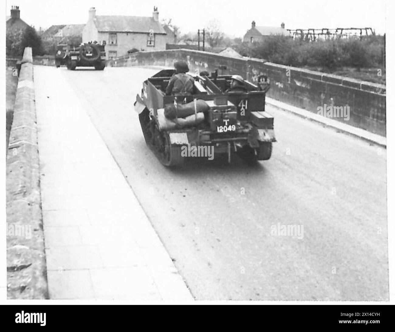 EXERCISE IN NORTHERN COMMAND - Enemy Bren gun carriers crossing a ...