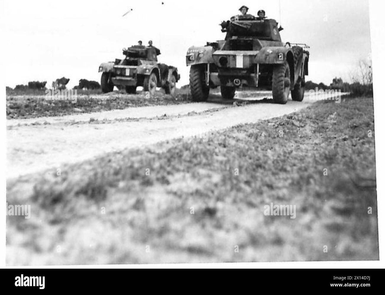 A British Army scout car advances in box formation during a ...