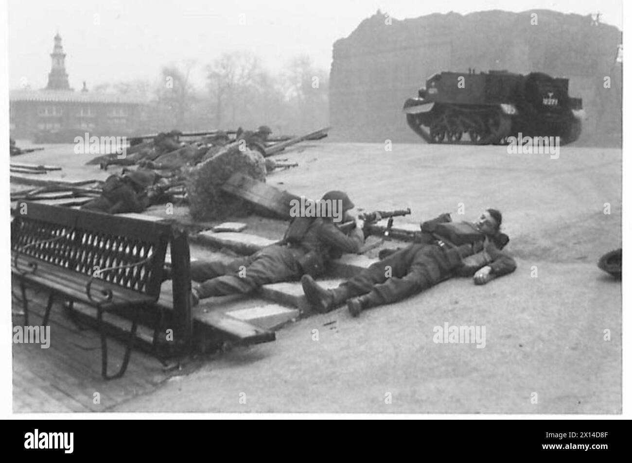 DEMONSTRATION TO FACTORY WORKERS - Infantry going into action with ...