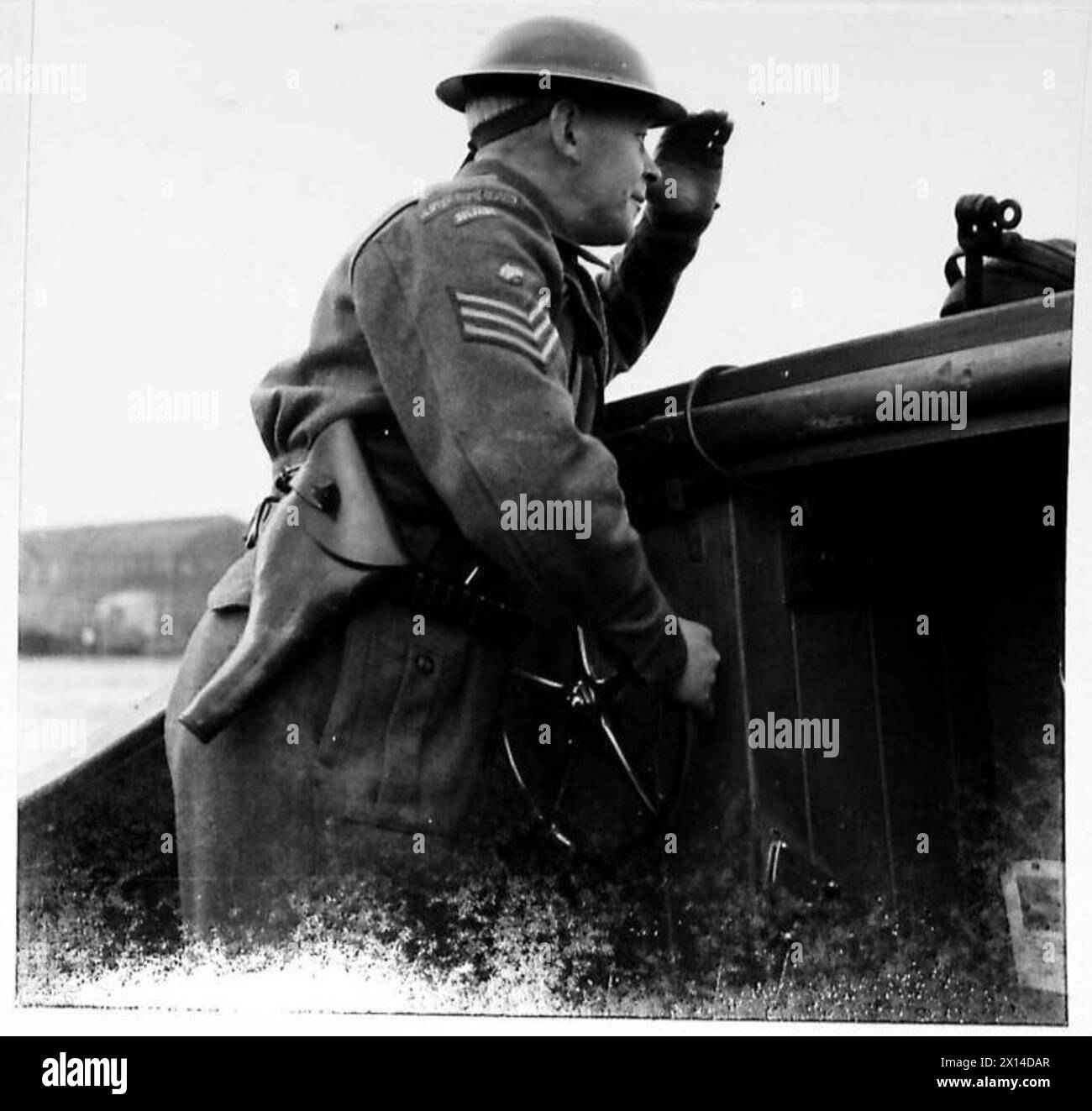 HOME GUARD MOTOR BOAT PATROL - A platoon sergeant at the helm during ...