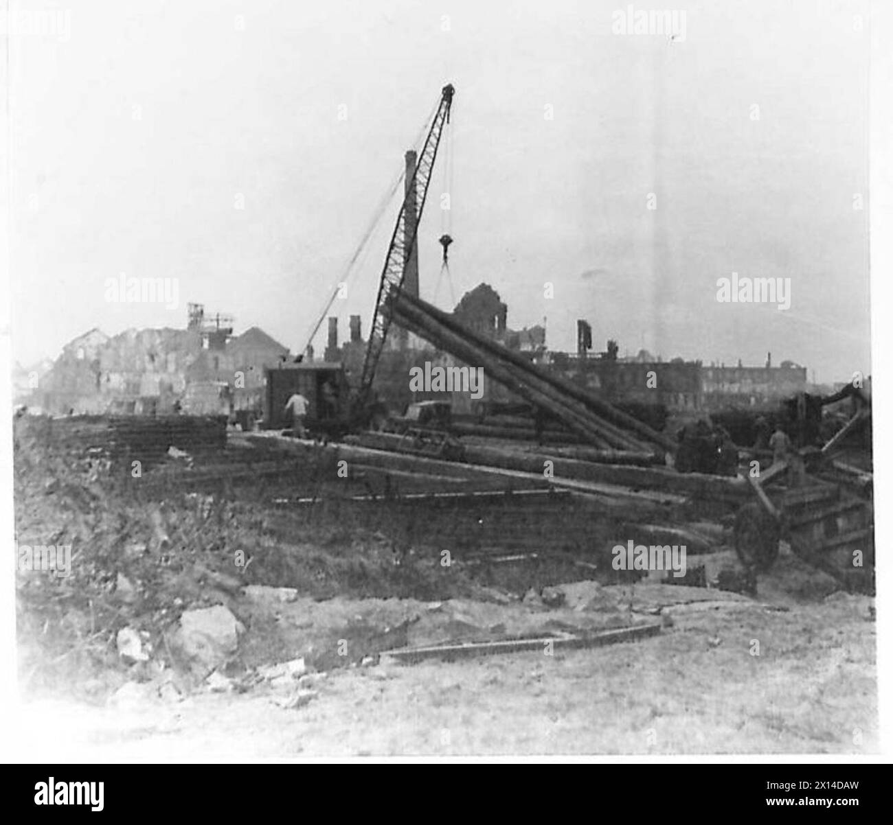 RE-BRIDGING THE PO RIVER - Piles being unloaded by crane , British Army ...
