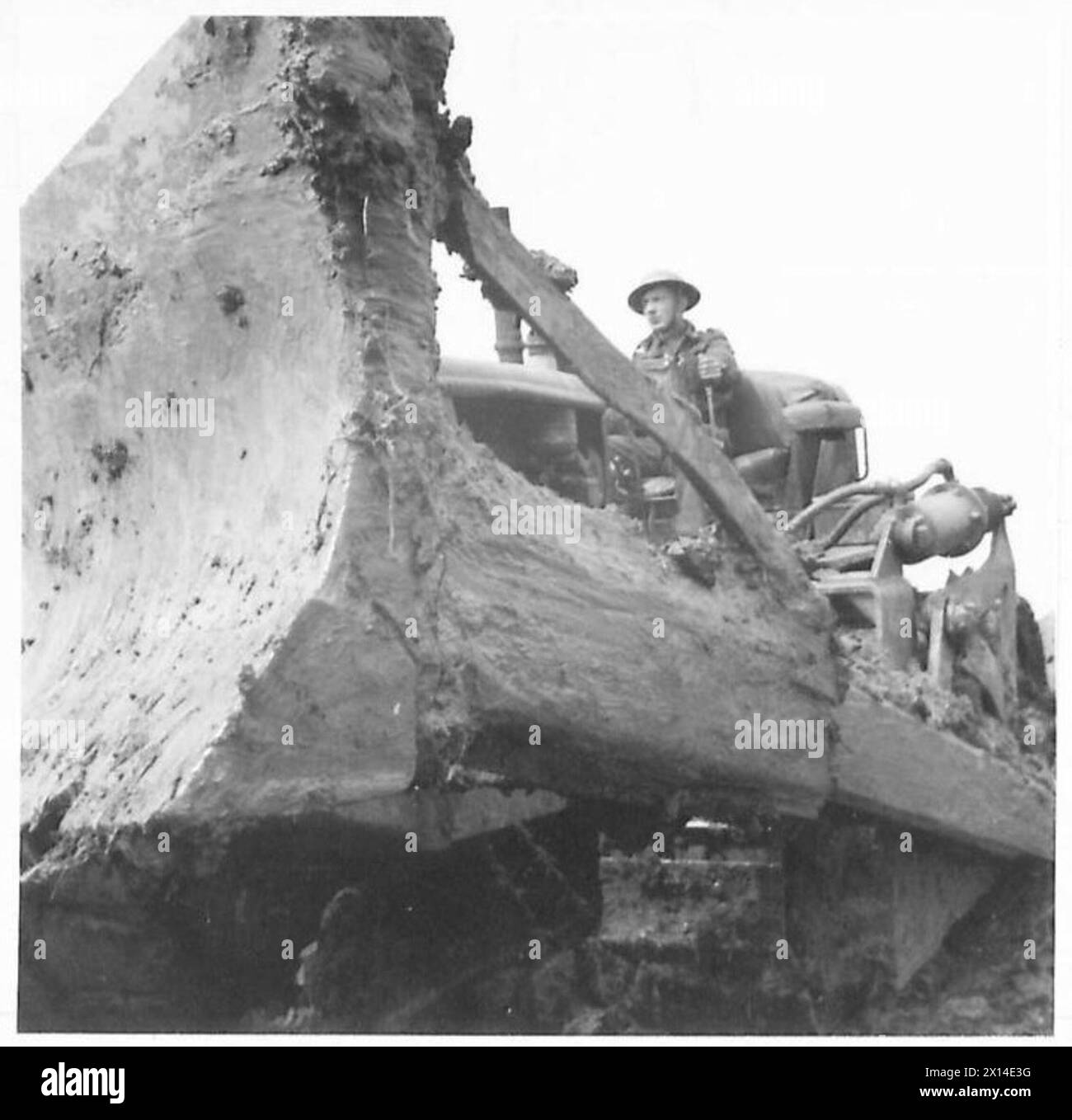 BRITISH ARMY USES AMERICAN "BULLDOZER" - A close up of the huge machine ...