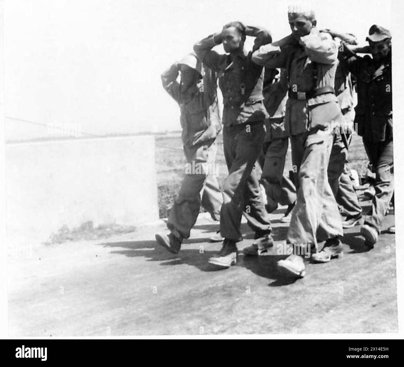 German prisoners of war captured by the British Army during a battle at ...