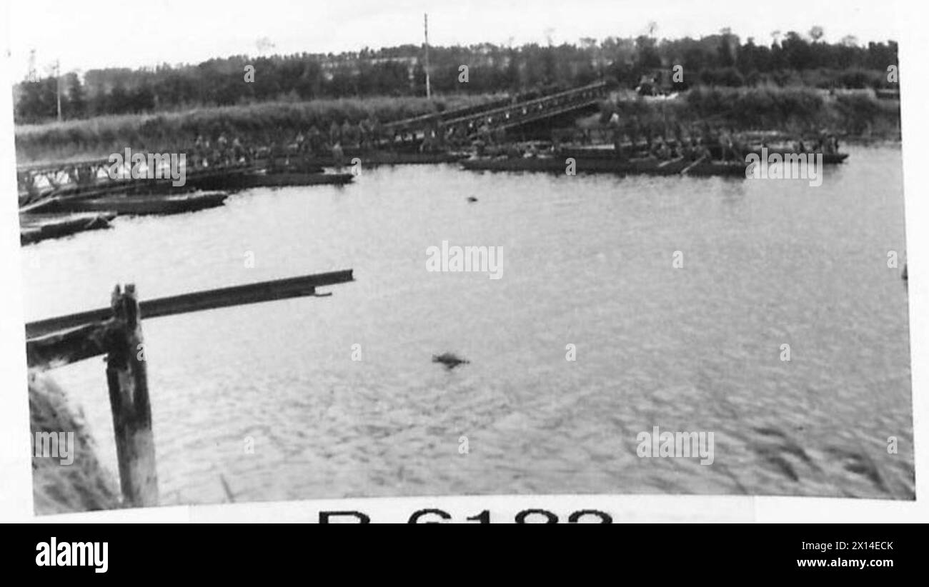ROYAL ENGINEERS CONSTRUCT A BAILEY BRIDGE - The pontoons carrying the ...