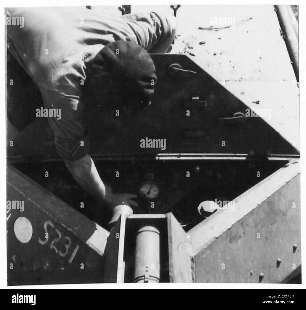 A British tank equipped with a front-mounted flame projector undergoes ...