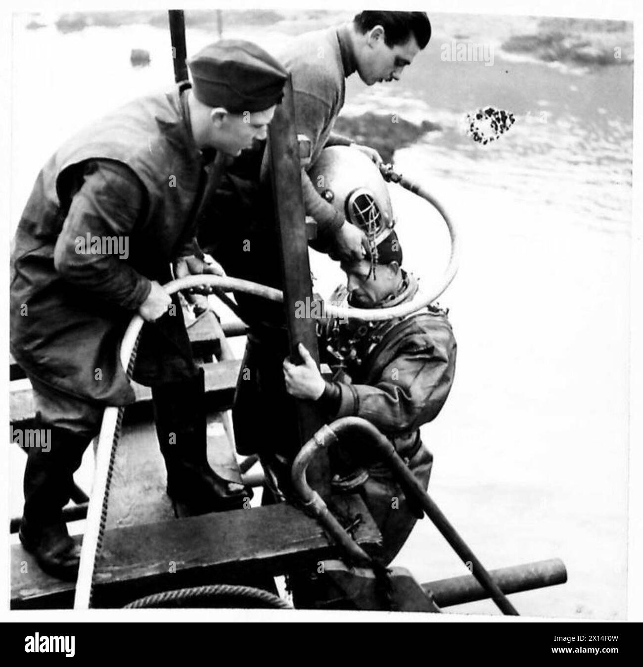 A British Army diver completes his assigned underwater operation ...