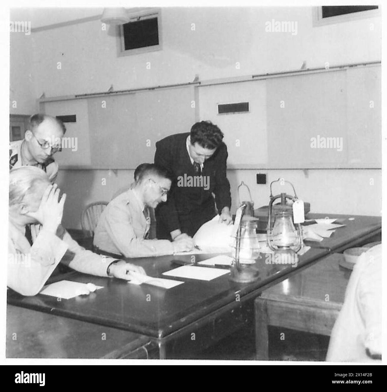 General Andre de Verdillac, leader of Vichy France, signs the British ...