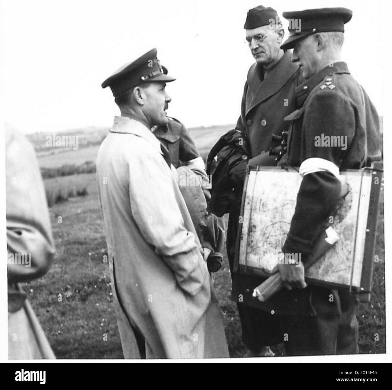 British and American officers confer during the Atlantic exercise, a ...