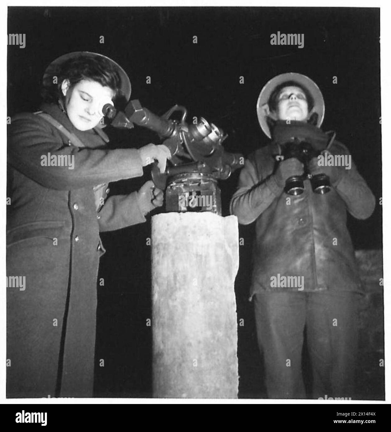 Spotters Miss M. Methven and Miss M. Holme monitor the skies for ...