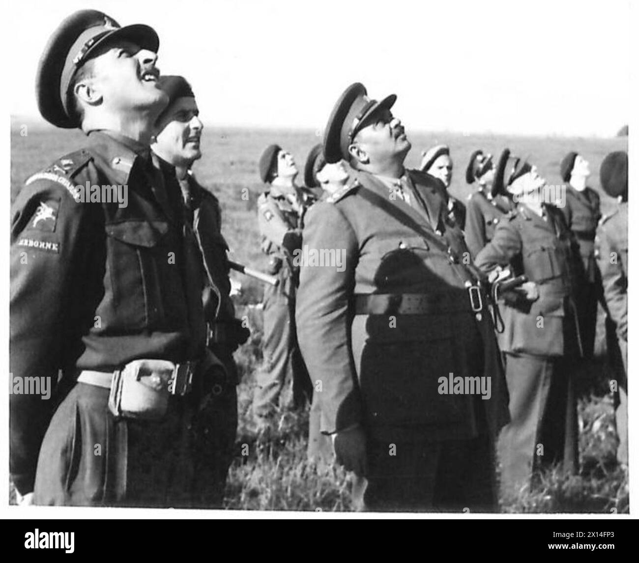 Major General F.A.M. Browning and His Highness observing a parachute ...