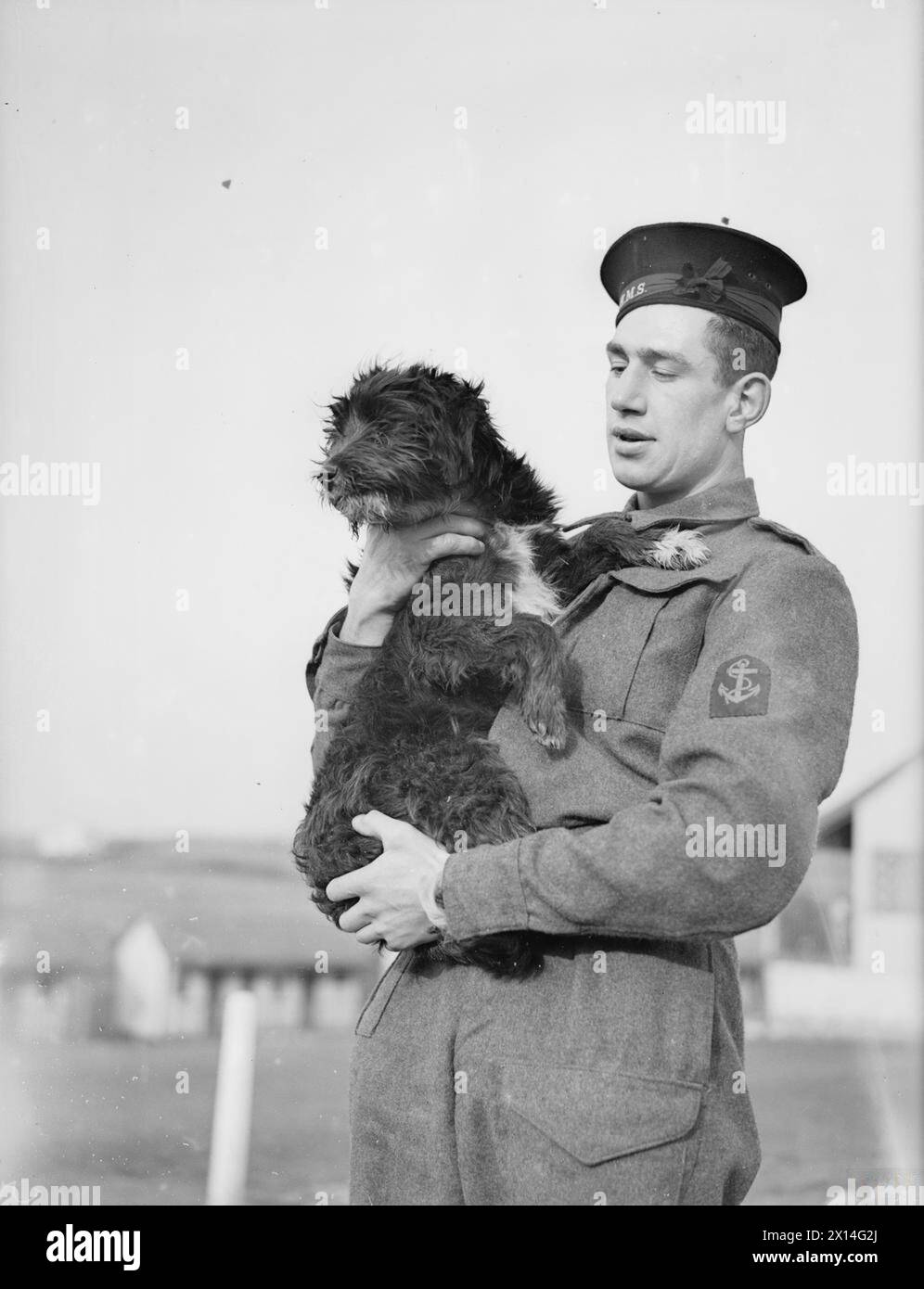 ROYAL NAVY GUARD THE SHORES AS WELL AS THE SEAS. 1940, AT A NAVAL ...