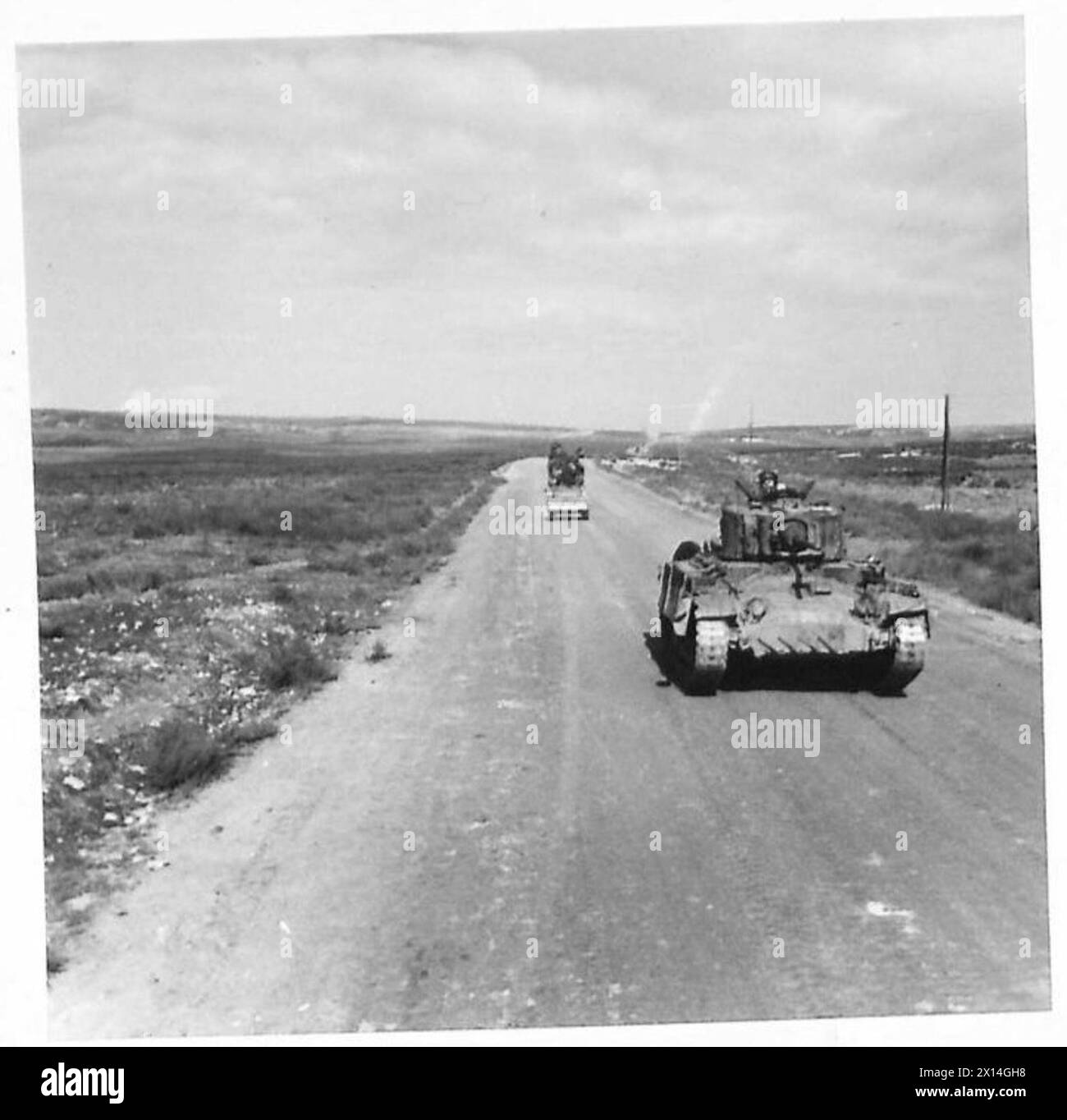 THE BRITISH ADVANCE ON THE THALA FRONT - A Crusader tank leading ...