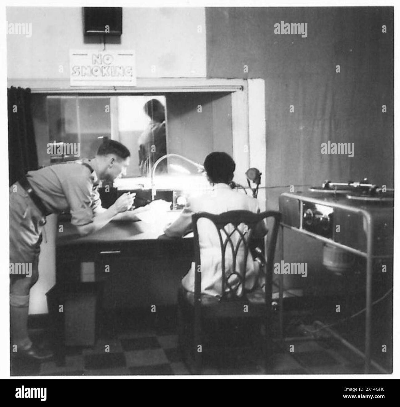 A British officer supervises a broadcast at the Addis Ababa ...