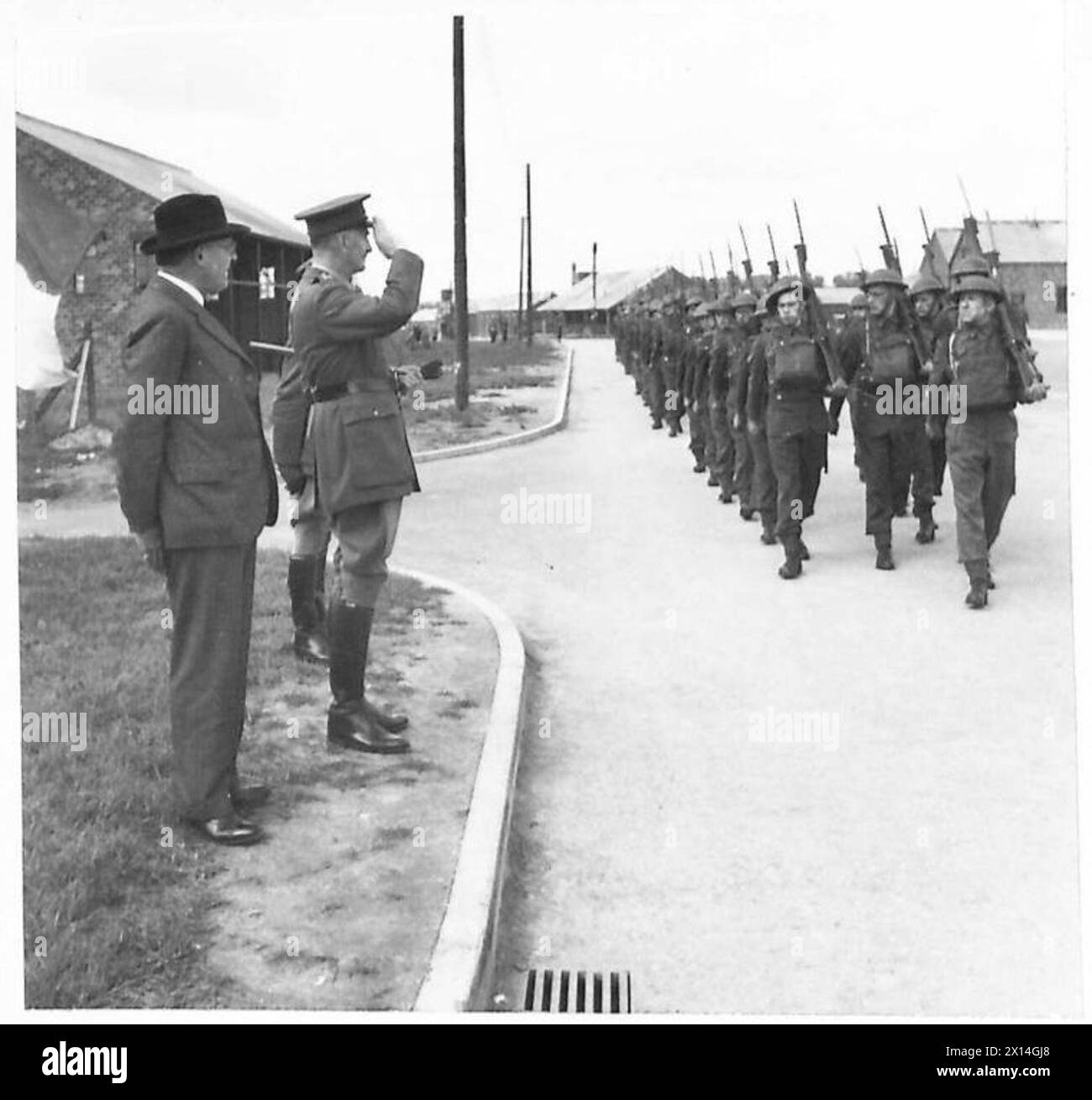 BOMB DISPOSAL GROUP INSPECTION - Taking the salute at a March Past ...