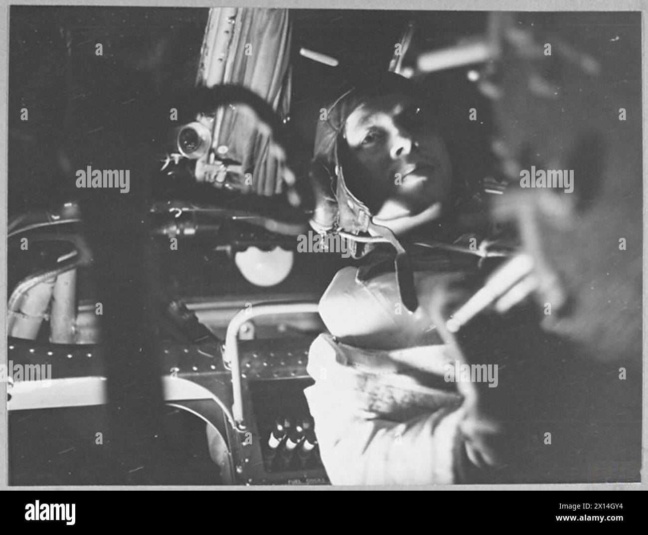 A Halifax bomber pilot awaits the take-off signal, supported by RAF ...