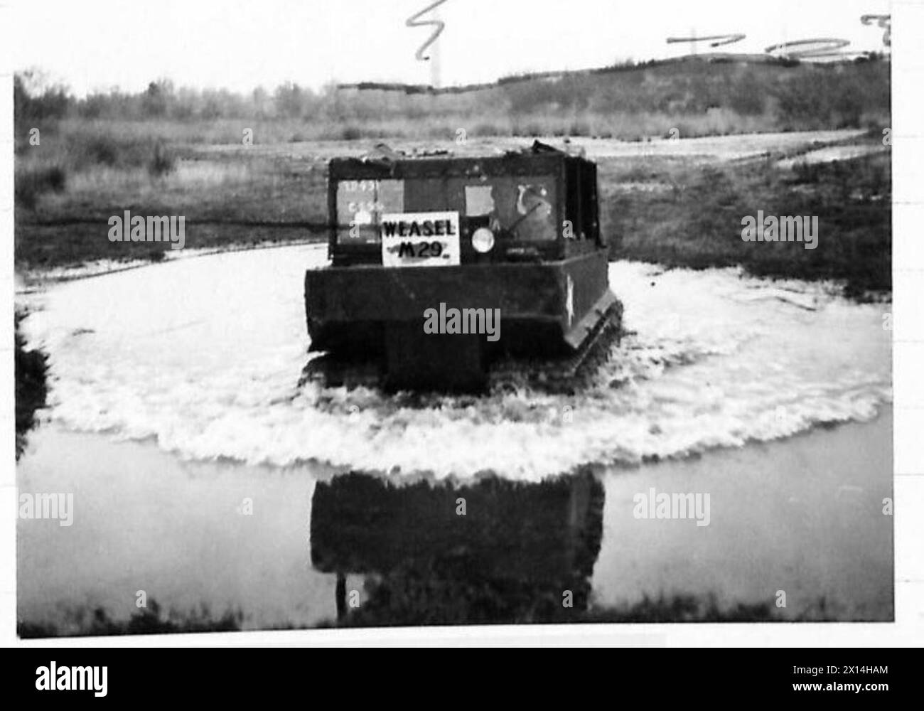 DEMONSTRATION OF AMPHIBIOUS VEHICLES - Weasel 29 crosses a swamp ...