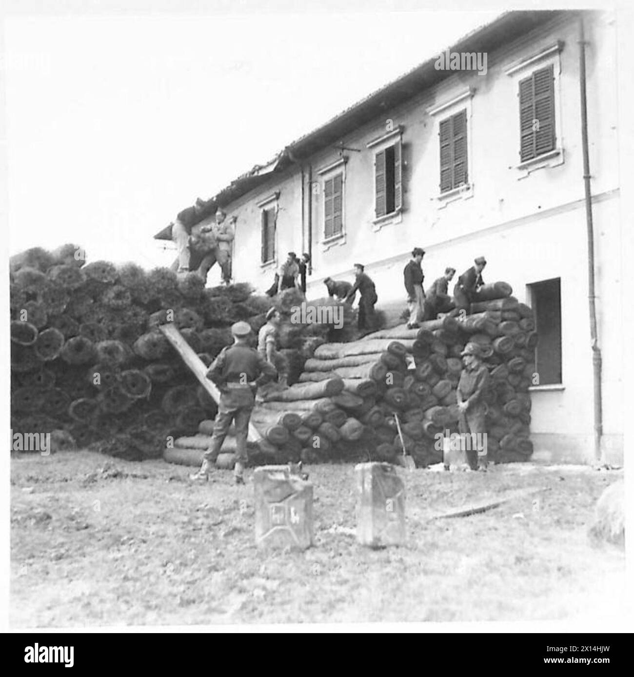 Italian pioneers work under South African supervision at the Royal Engineers dump for the ...