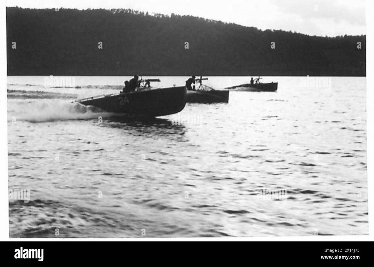 HOME GUARD "MARINES" - Speed boats in action with machine gunner ready ...