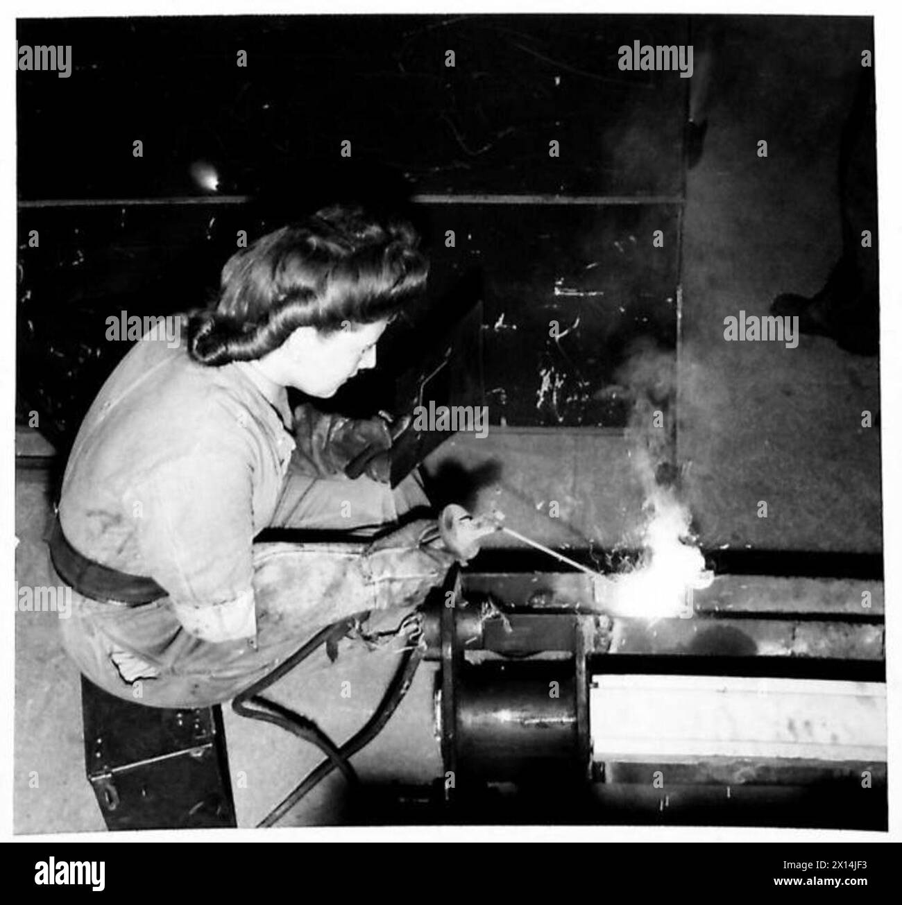 Private M. Curtis of the Auxiliary Territorial Service (ATS) performs ...