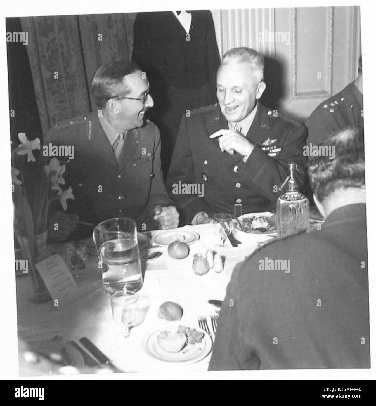 General Sir Alan Brooke and Lt. Gen. P.M. Andrews are seated at the ...