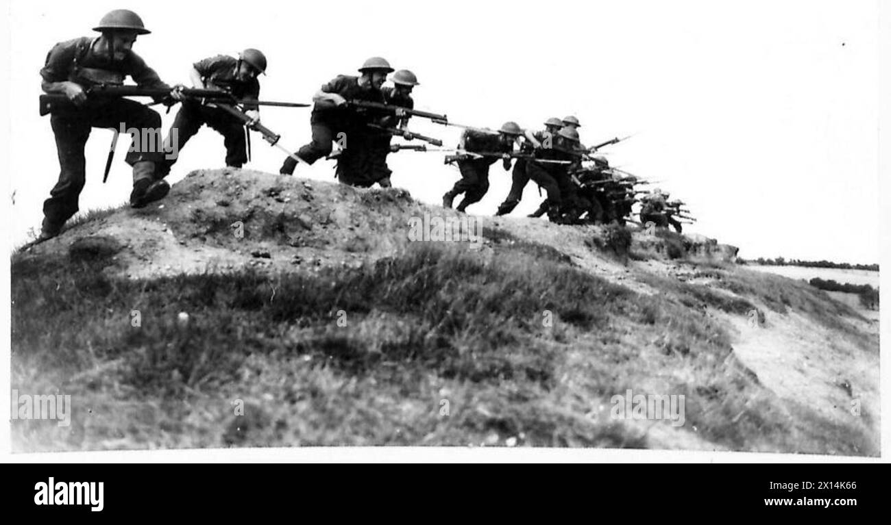 INFANTRY IN TRAINING - The men going " over the top" British Army Stock ...