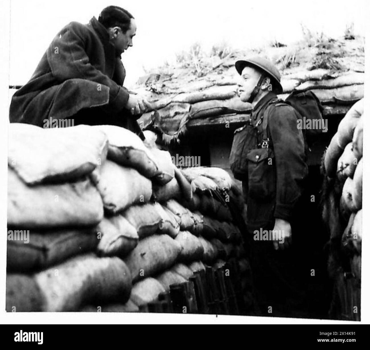 GETTING FIRST HAND INFORMATION - Mr. A.P. Ryan talking to troops during ...