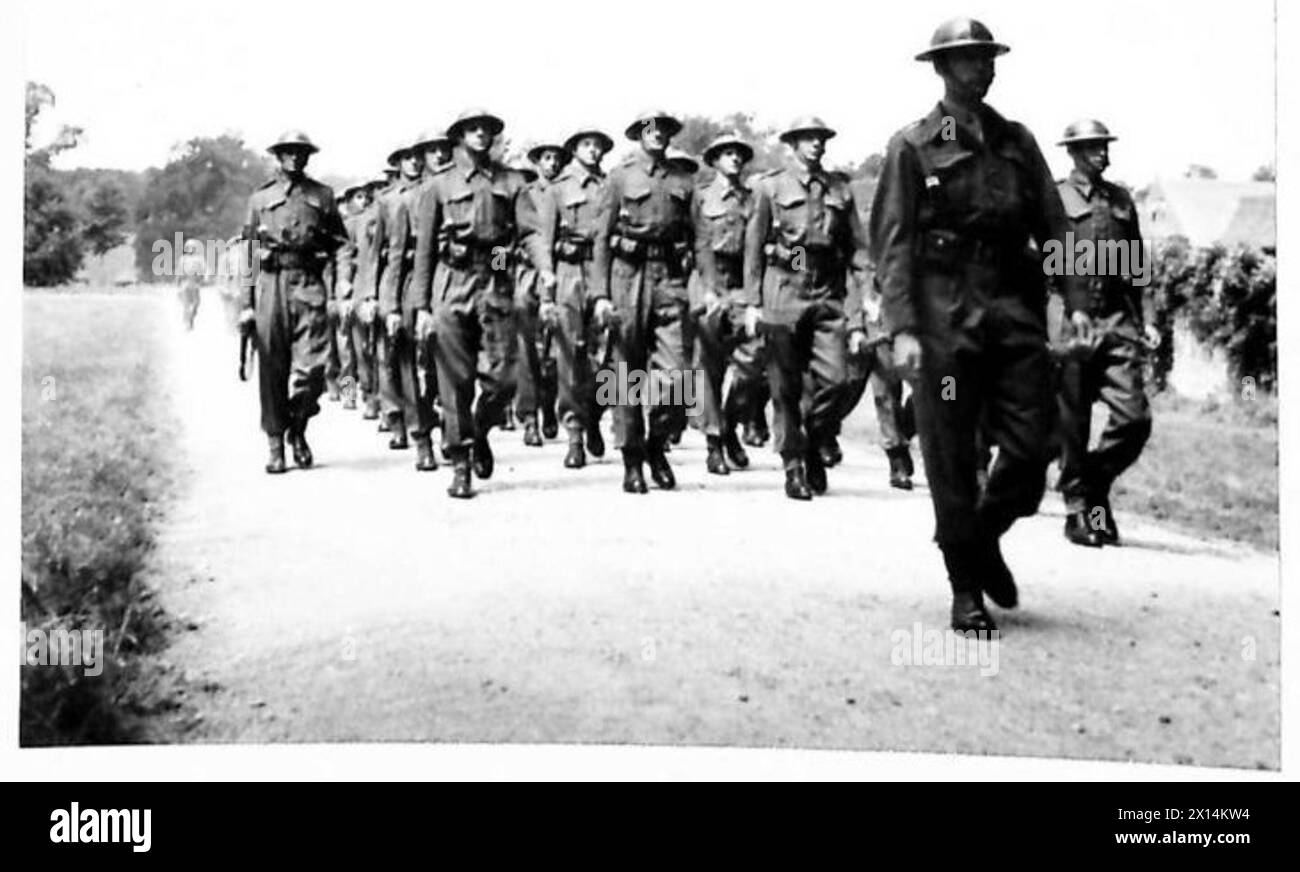 THE KING AND QUEEN VISIT TROOPS - The Guard of Honour marching off after inspection by the King ...