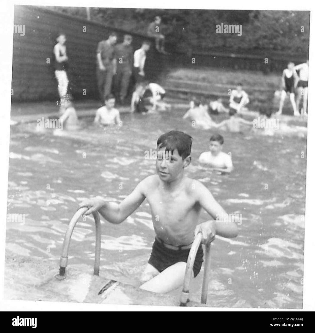A cadet at an Army Cadet Force camp leaves the bath after swimming ...