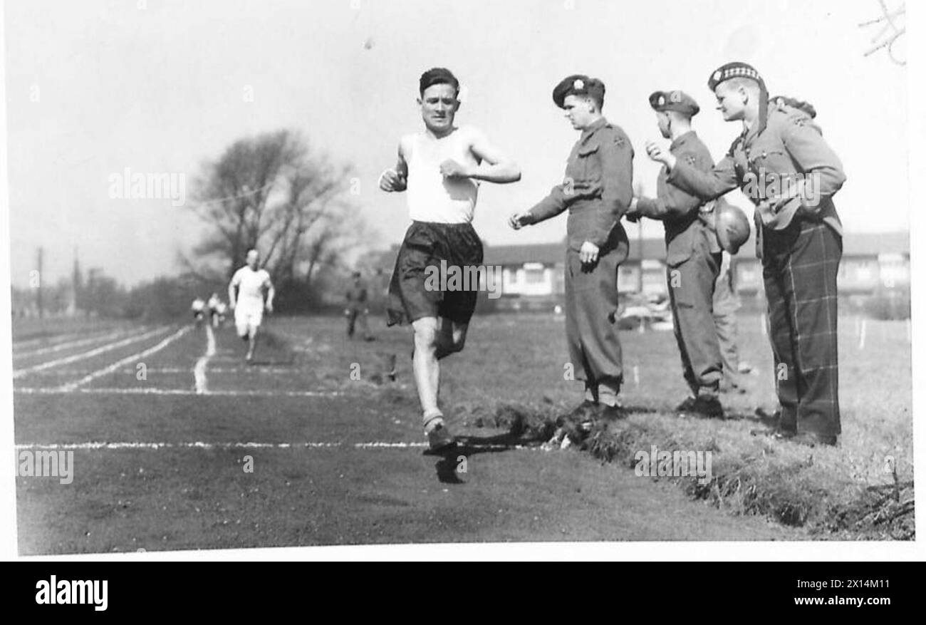 Lance Corporal Dakers wins the mile race at a regimental sports day ...