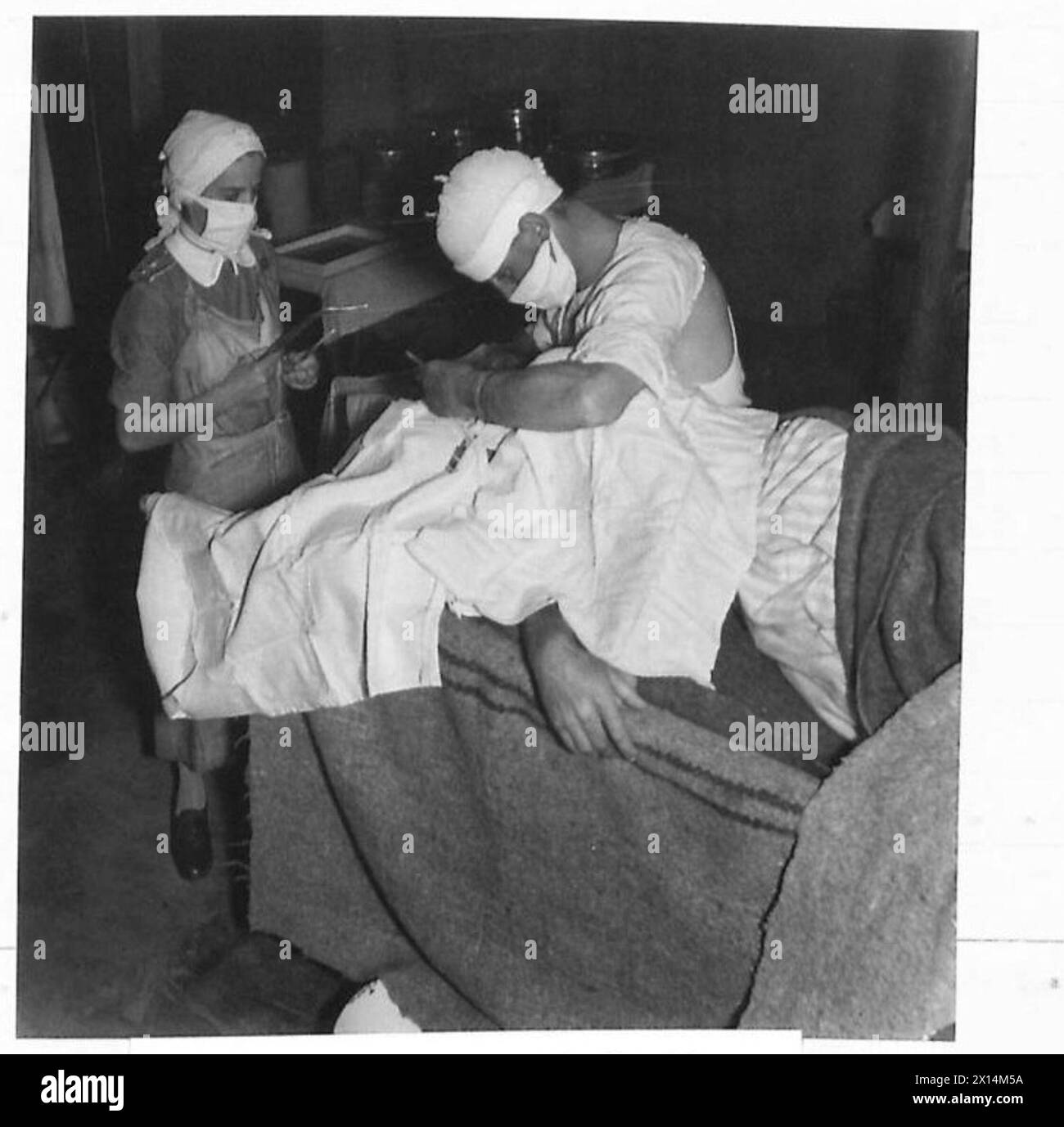WOMEN AT WAR - Sister M. Willis assisting the surgeon, Major A.I.S ...
