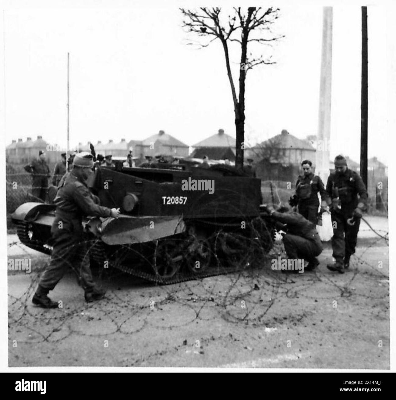 WAR CORRESPONDENTS VISIT EASTERN COMMAND - An "enemy" armoured vehicle ...