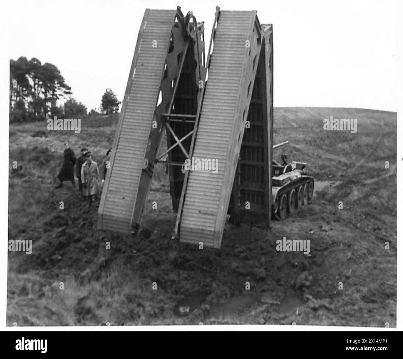 A Scissors Bridge is being constructed over a ditch during a ...