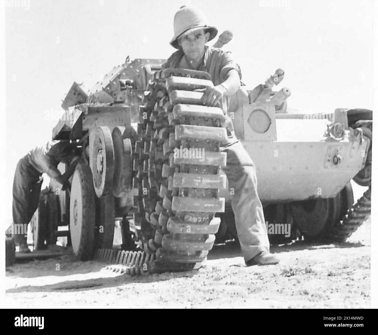THE DESERT BLACKSMITH - It's hard work getting the tracks off a tank ...